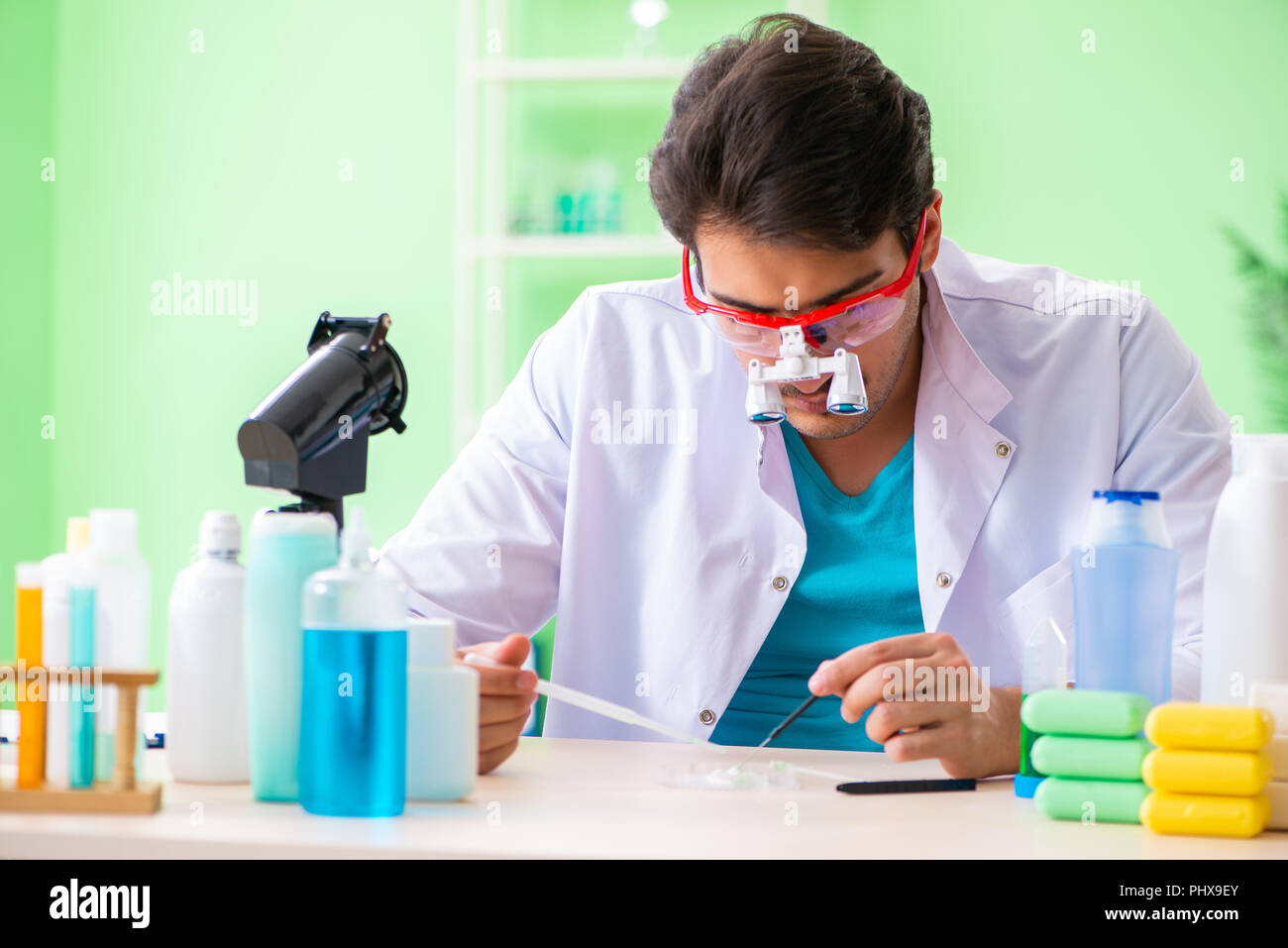Chemist testing soap in the lab Stock Photo - Alamy