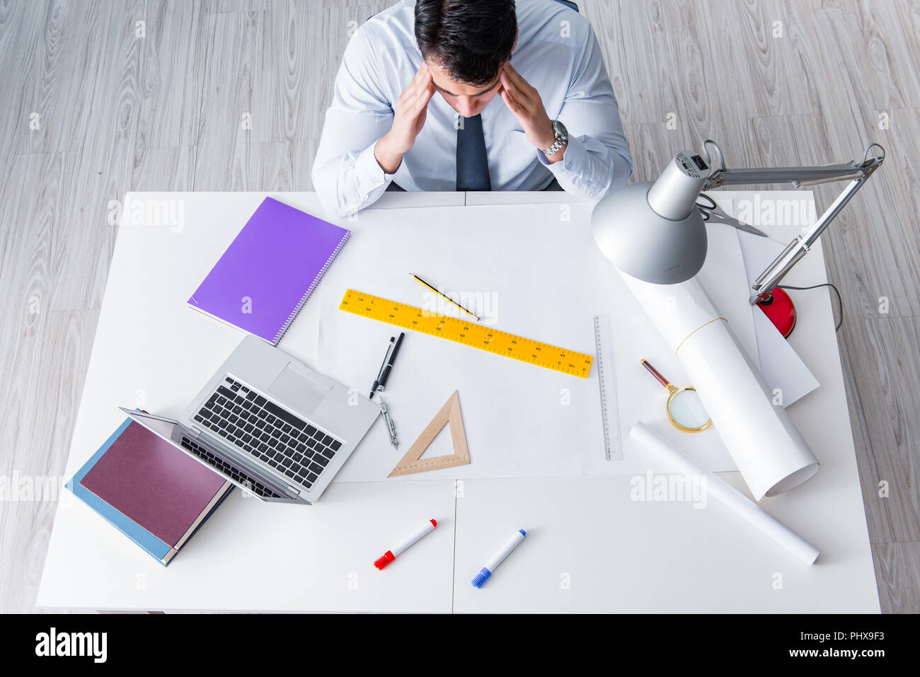 Engineer working on new project drawings Stock Photo - Alamy
