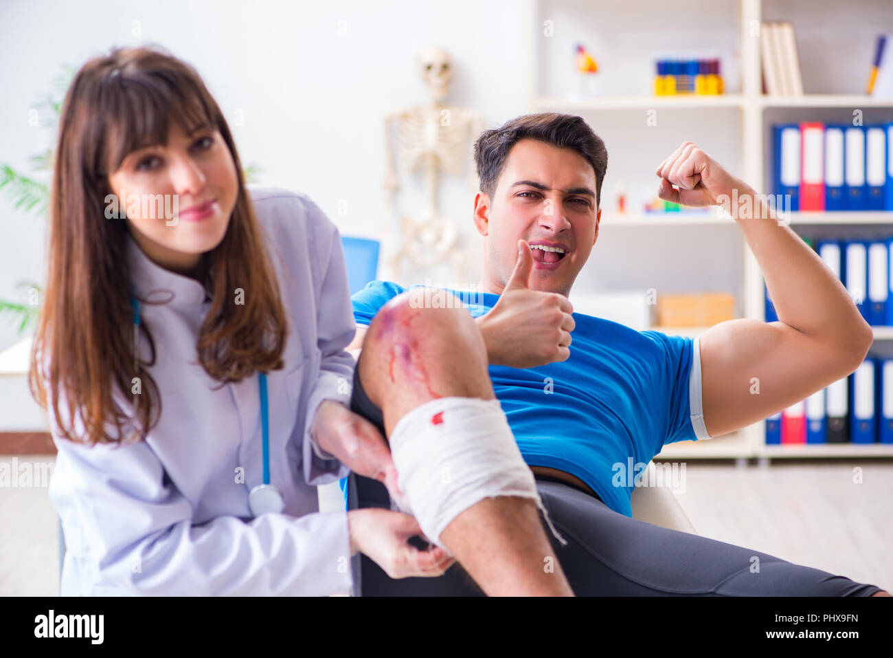 Patient visiting doctor after sustaining sports injury Stock Photo - Alamy