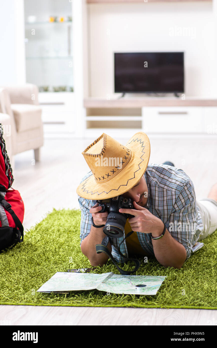 Man planning his travel with map Stock Photo - Alamy