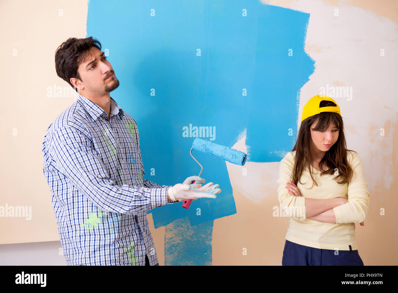 Husband and wife doing renovation at home Stock Photo - Alamy