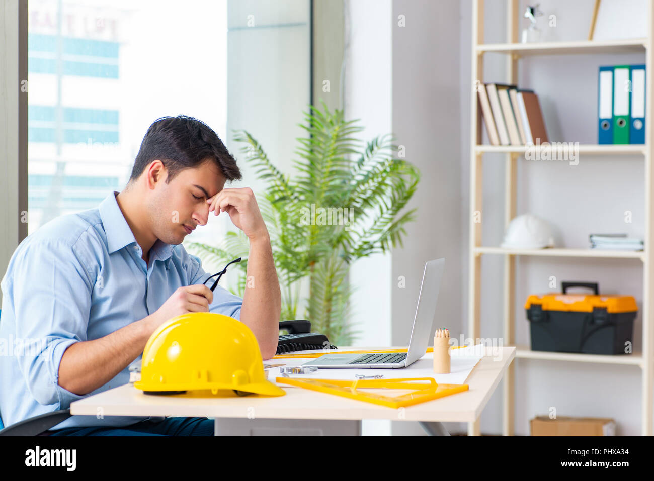 Construction engineer working on new project Stock Photo - Alamy