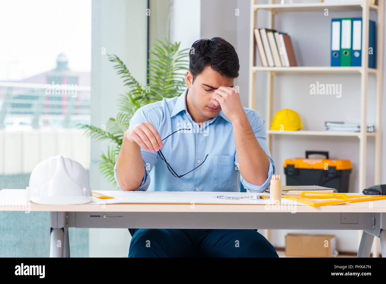 Construction engineer working on new project Stock Photo - Alamy