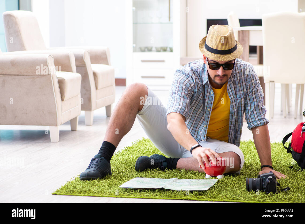 Man planning his travel with map Stock Photo - Alamy