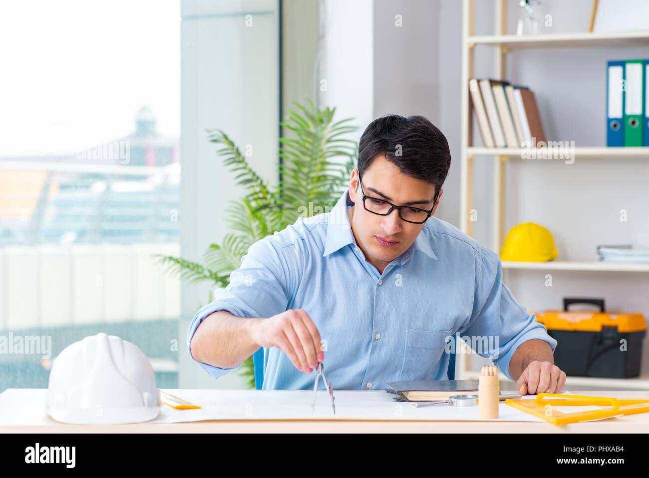 Construction engineer working on new project Stock Photo - Alamy