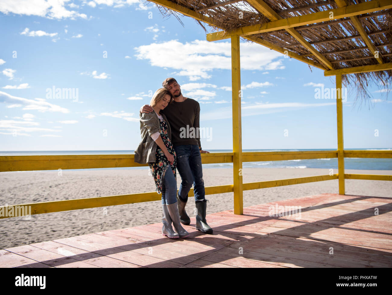 Couple spinning around on beach hi-res stock photography and images - Alamy