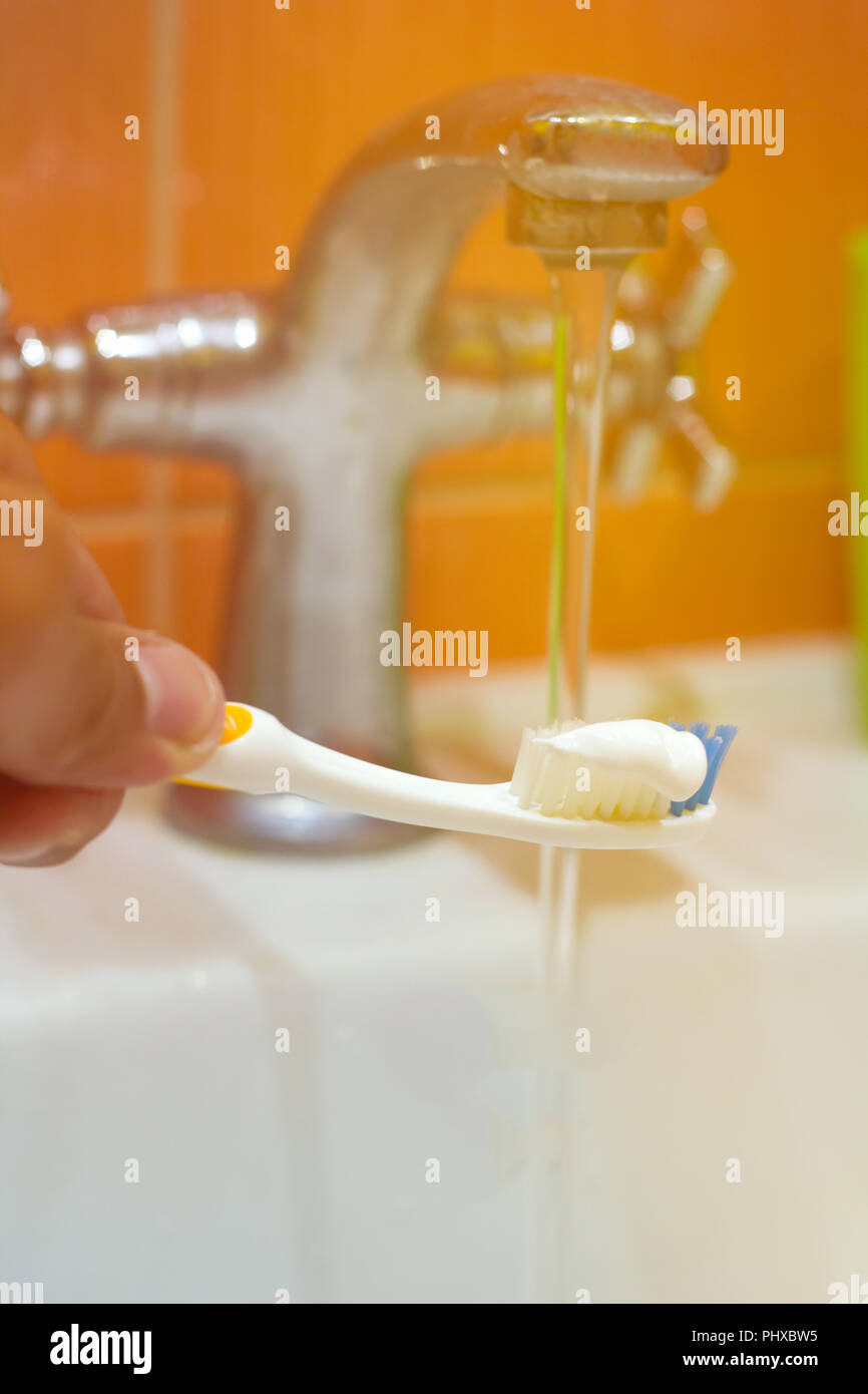 Brush teeth tap hi-res stock photography and images - Alamy