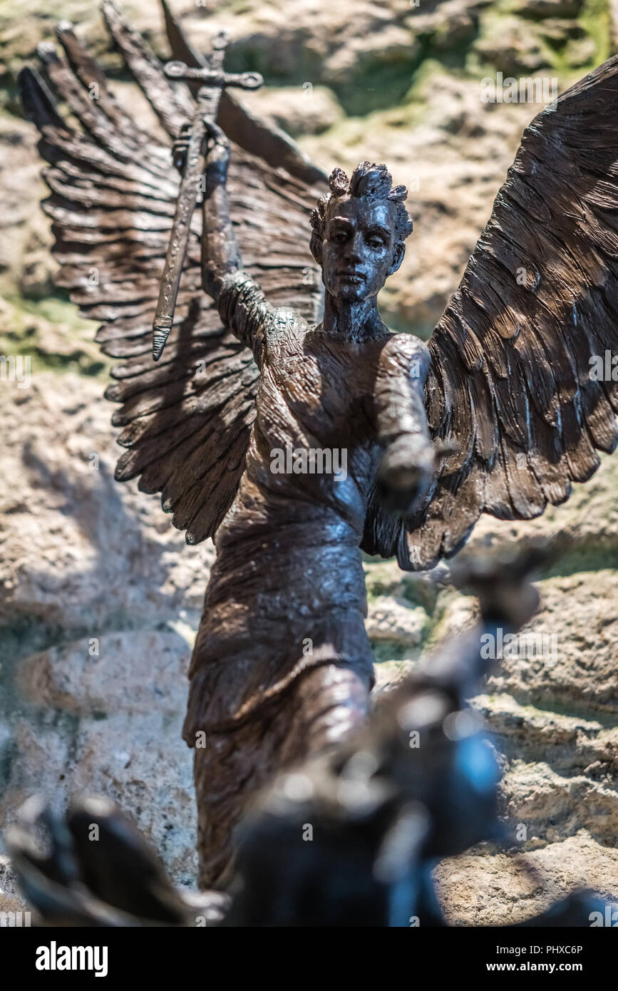 Marazion, England - May 2018 : Sculpture depicting angel killing demon ...