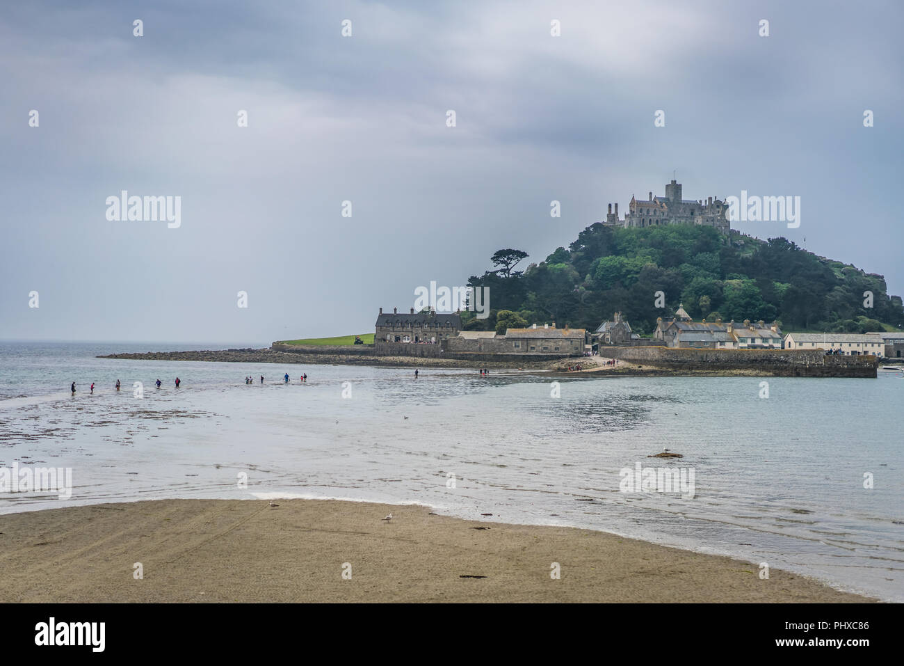 Marazion, England - May 2018 : People walking on a footpath leading to ...
