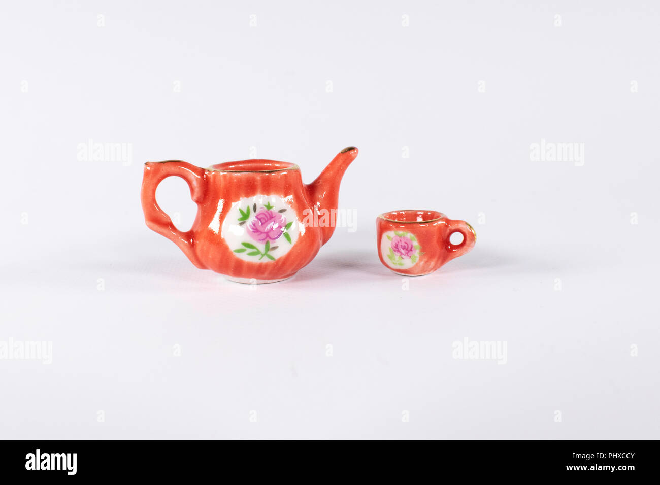Handmade vintage style teapot with a flower design. isolated Stock ...