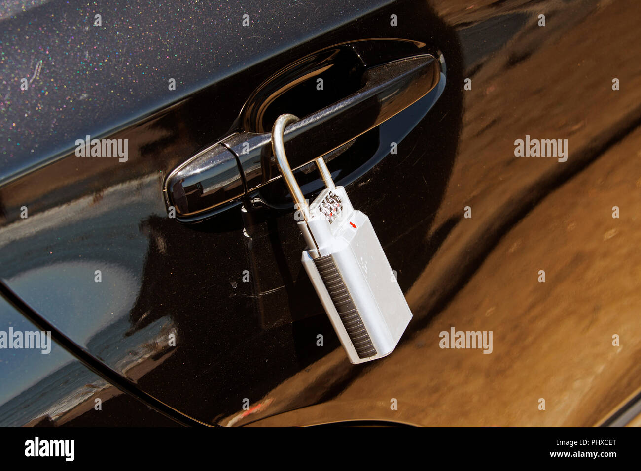A close up view of a lock box on the car's door Stock Photo - Alamy