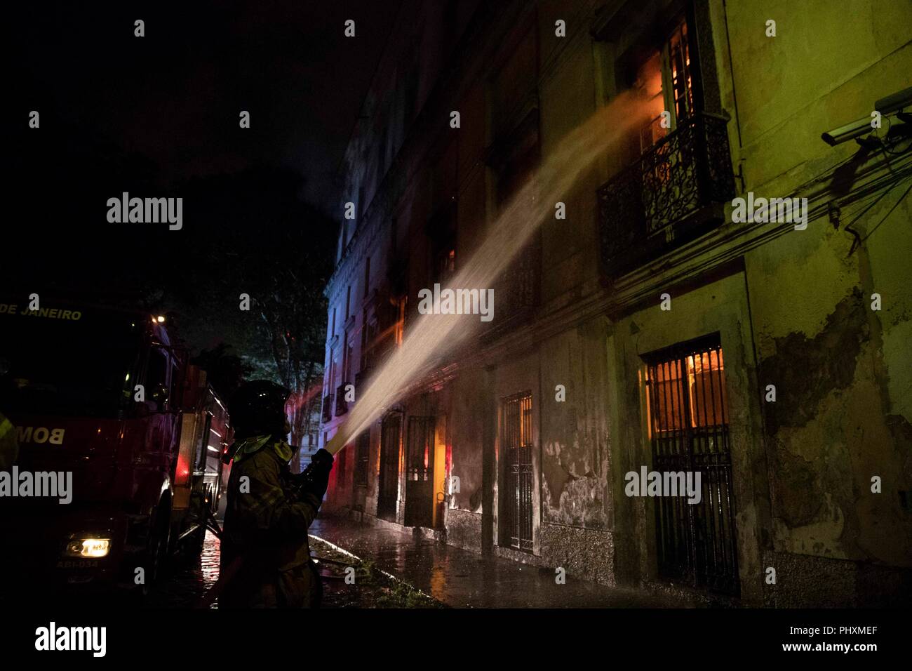 Rio De Janeiro, Brazil. 2nd Sep, 2018. A firefighter trys to put out a ...