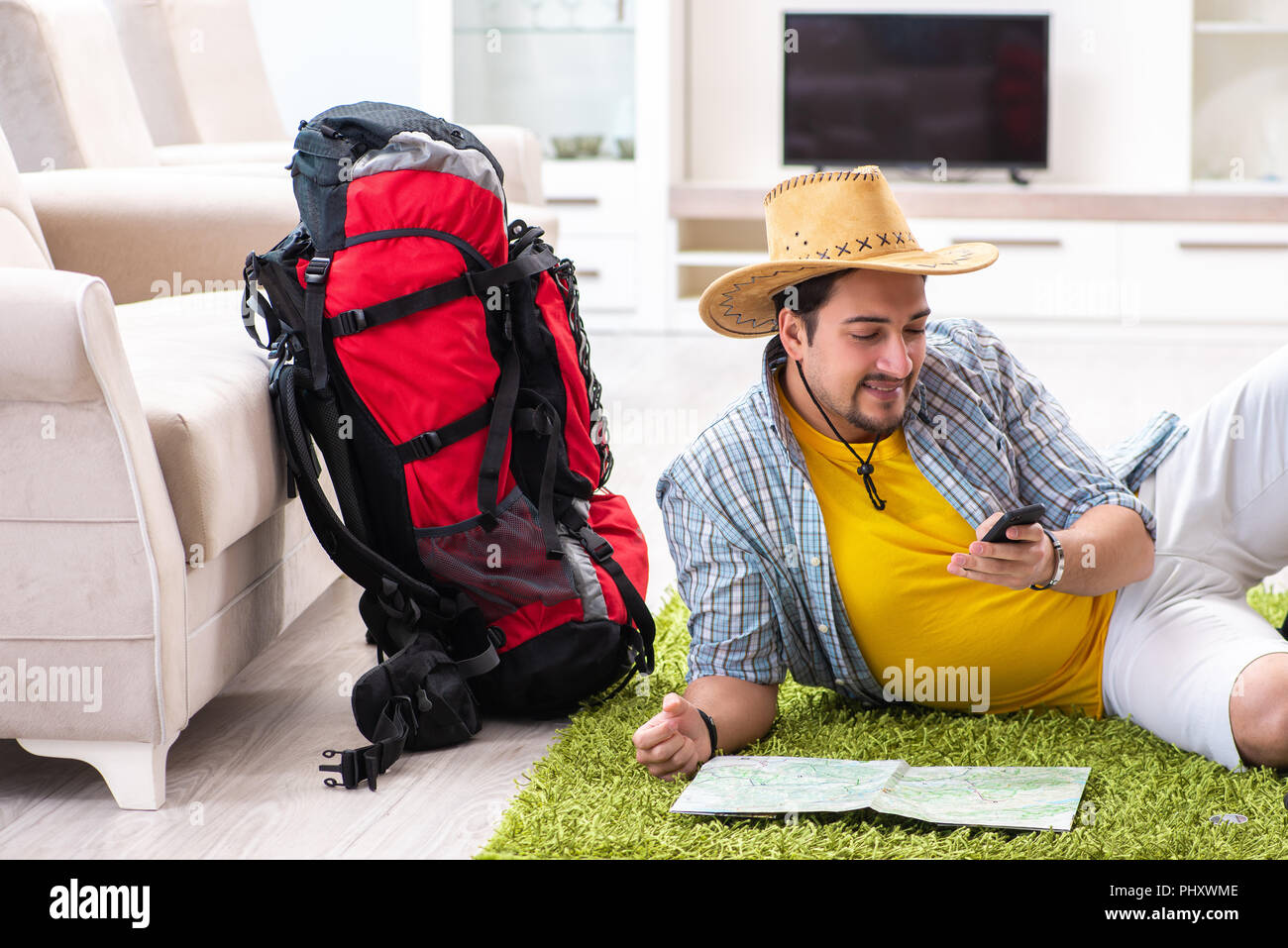 Man planning his travel with map Stock Photo - Alamy