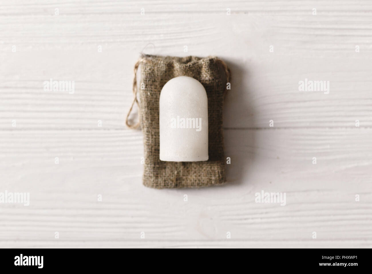 eco natural crystal alunite deodorant flat lay on rustic background ...