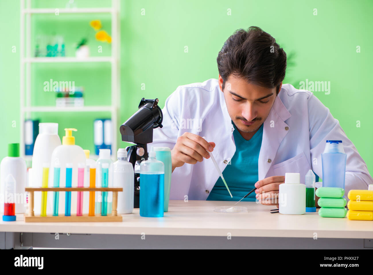Chemist testing soap in the lab Stock Photo - Alamy