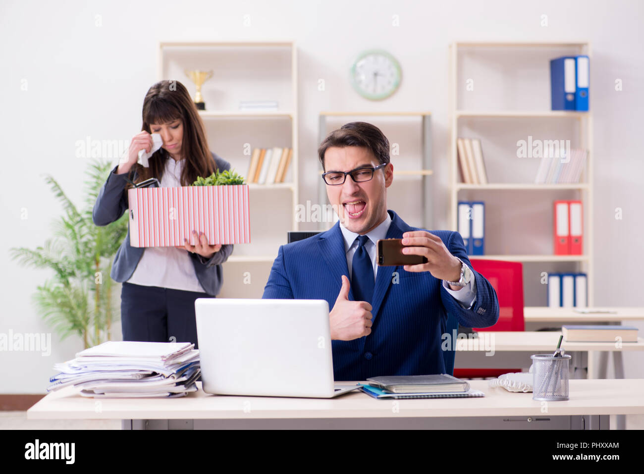 Person being fired from his work Stock Photo - Alamy