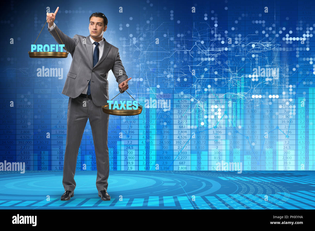Businessman comparing profit and taxes Stock Photo - Alamy