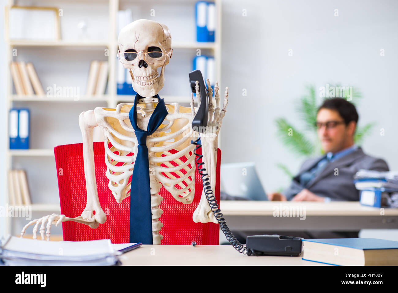 Man telephone skeleton hi-res stock photography and images - Alamy