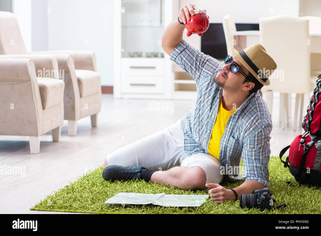 Man planning his travel with map Stock Photo - Alamy