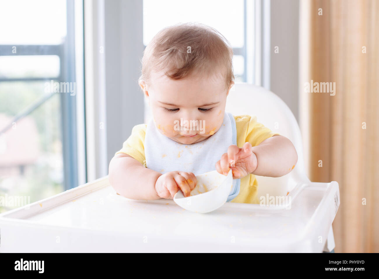 Portrait of cute adorable Caucasian child boy with dirty messy face ...