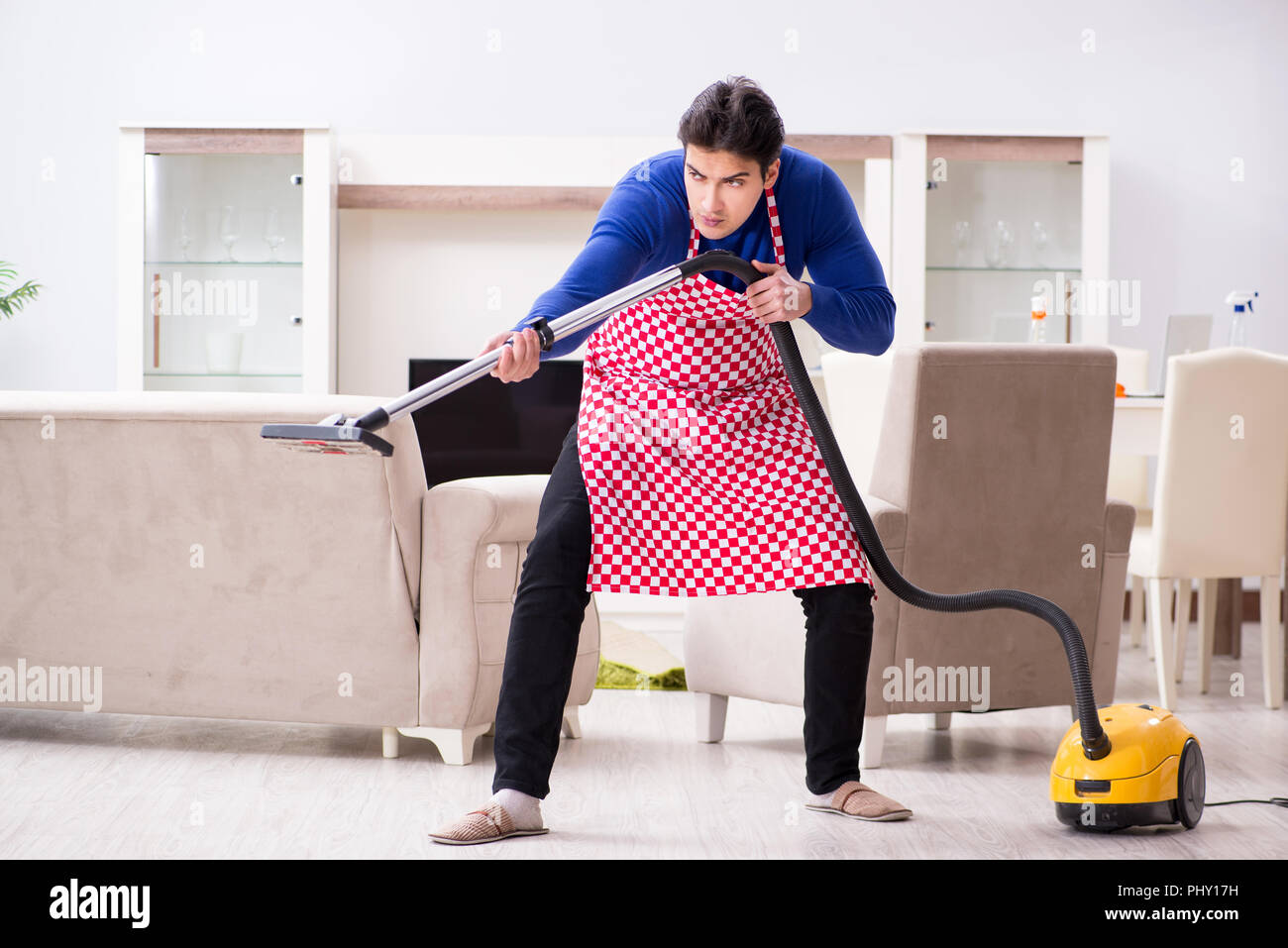 Houseman housekeeping cleaning vacuum cleaner hi-res stock photography ...