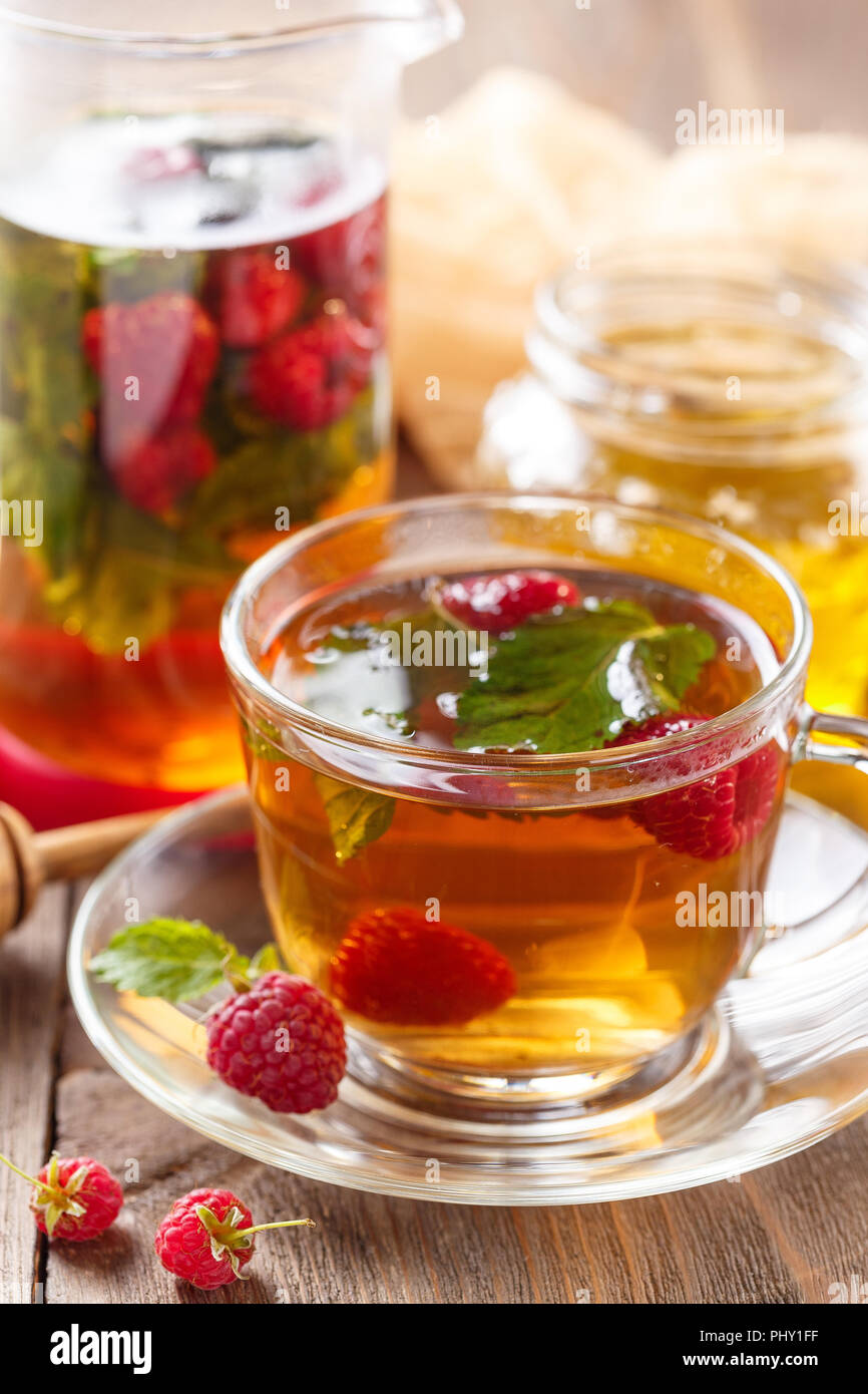 Tea with mint and raspberry Stock Photo - Alamy
