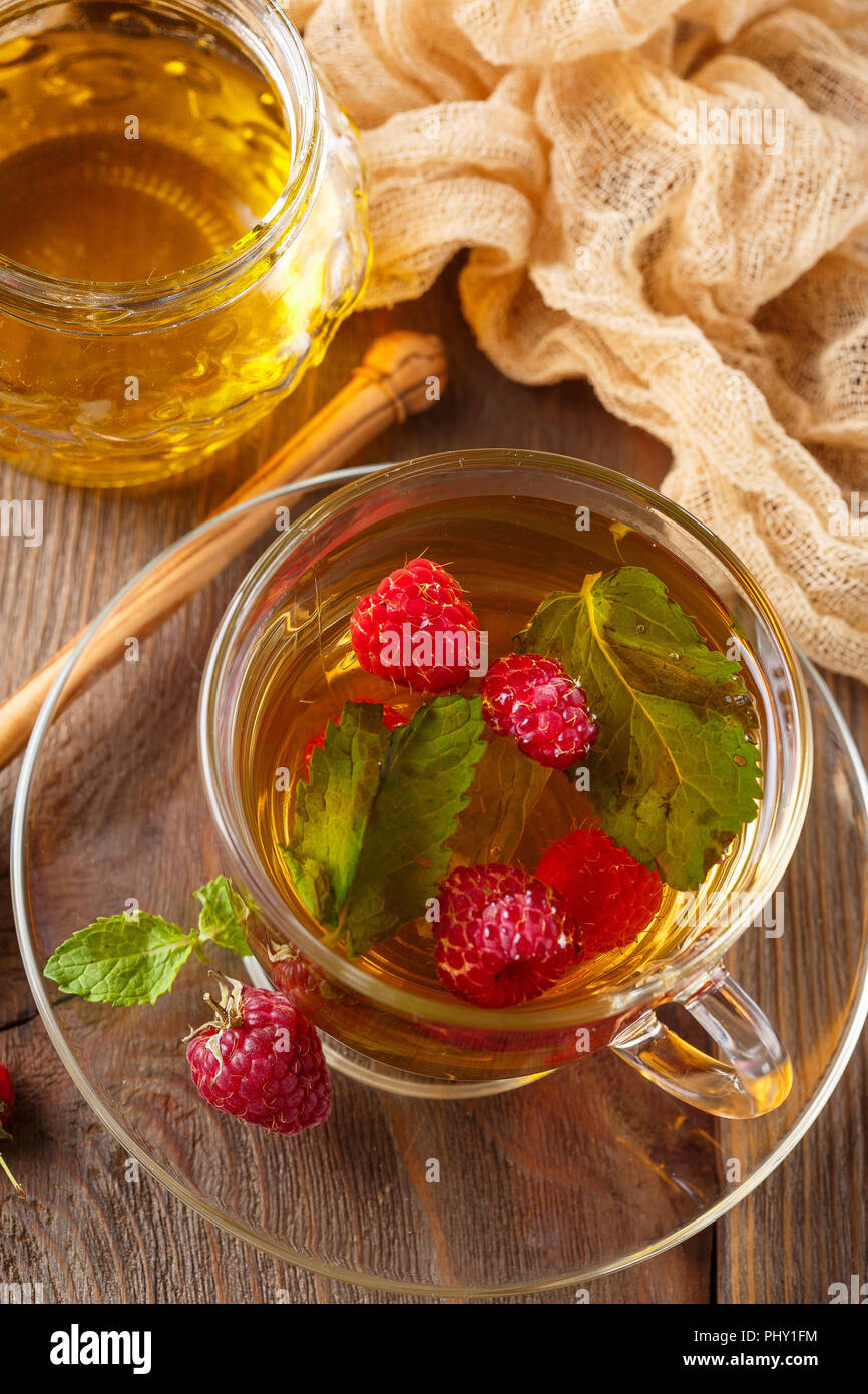 Tea with mint and raspberry Stock Photo - Alamy