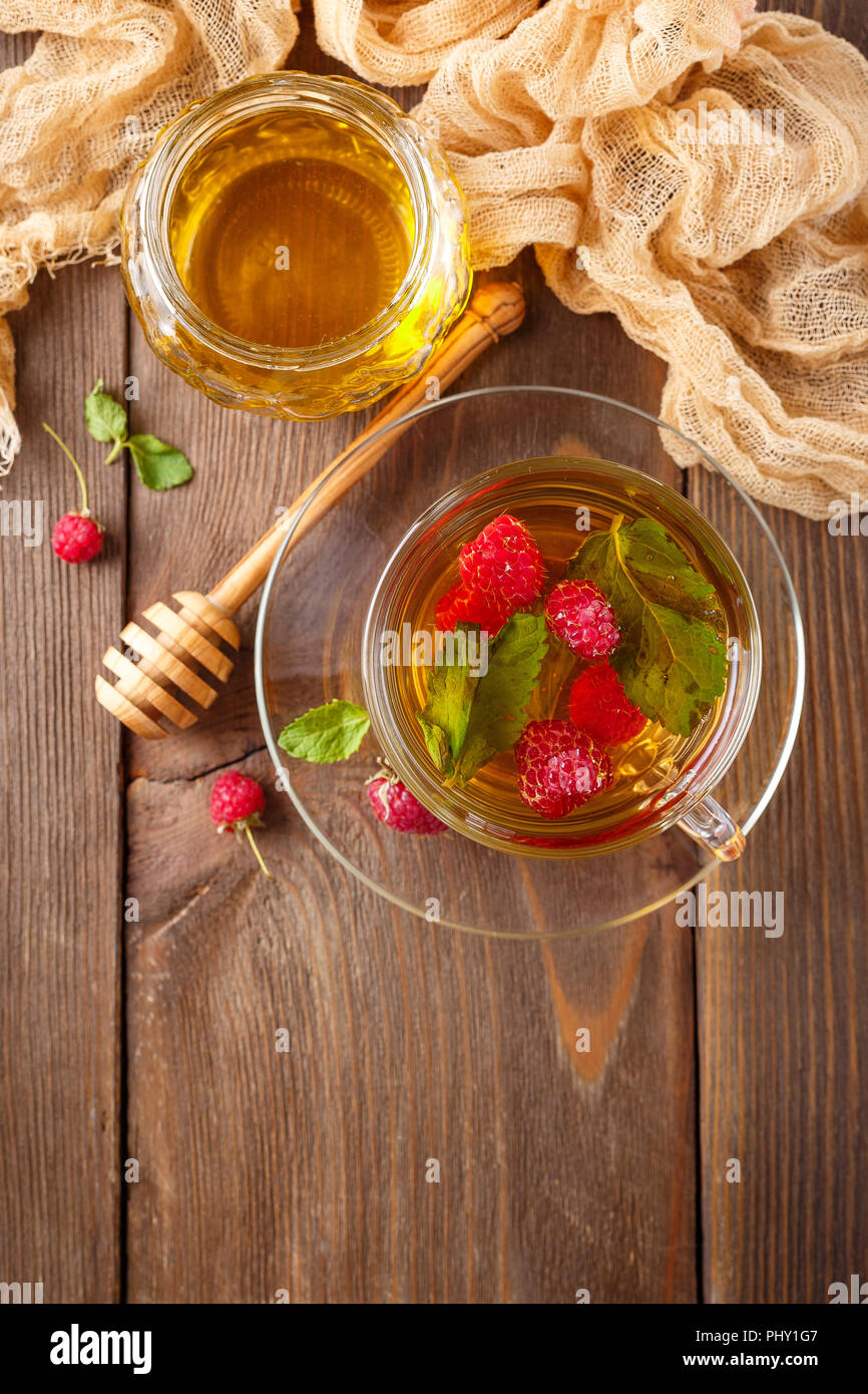 Tea with mint and raspberry Stock Photo - Alamy