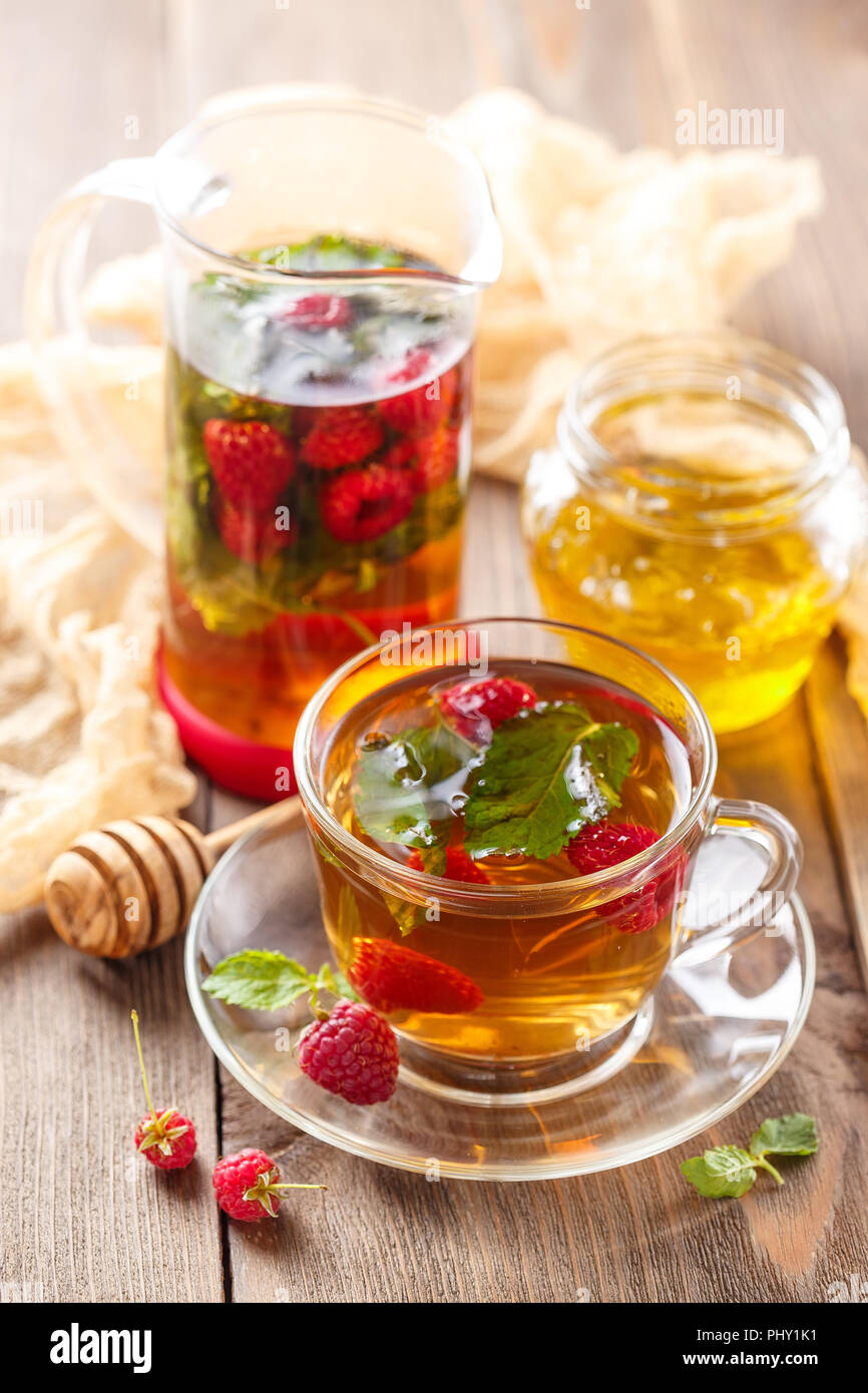 Tea with mint and raspberry Stock Photo - Alamy