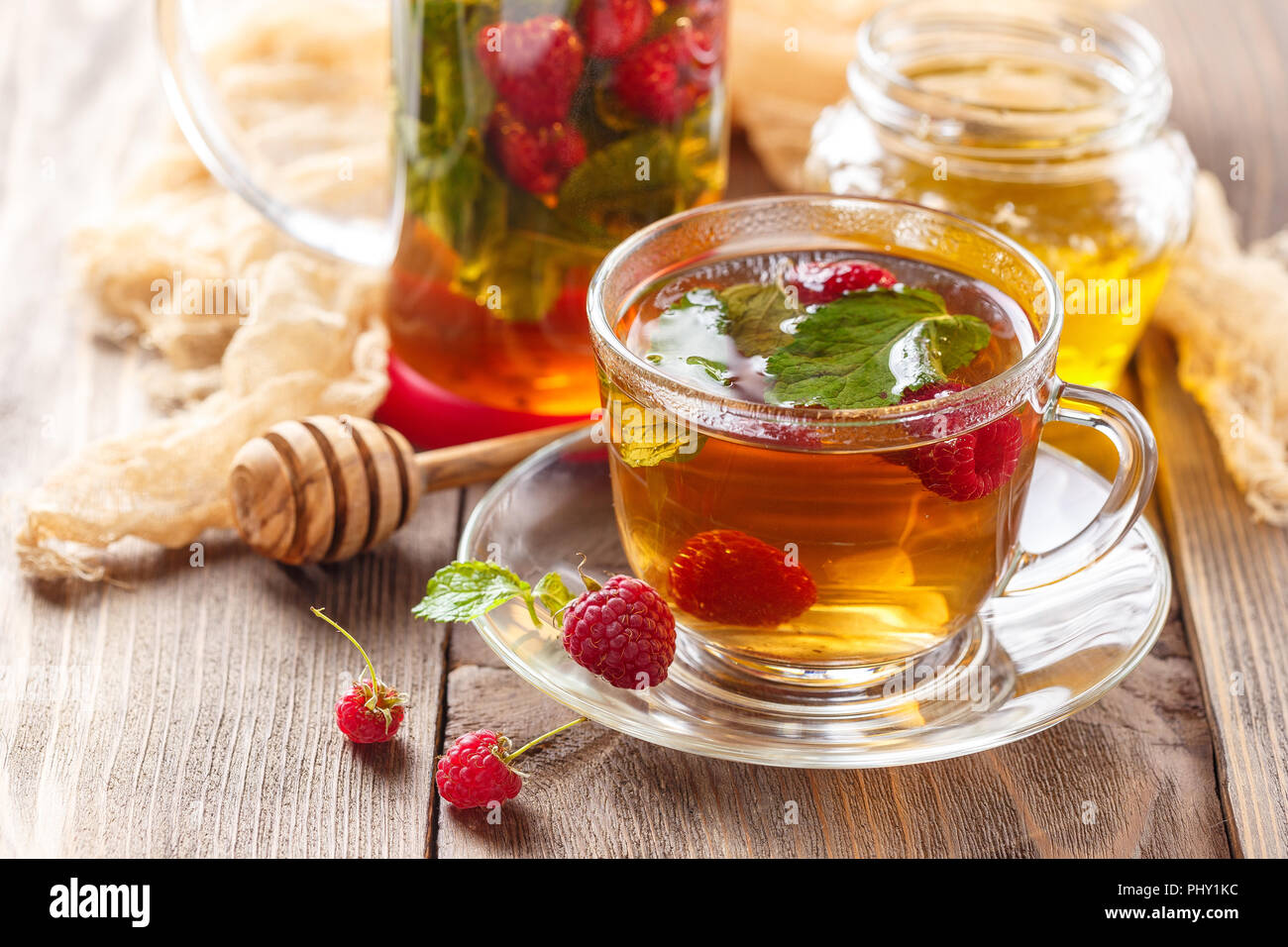 Tea with mint and raspberry Stock Photo - Alamy