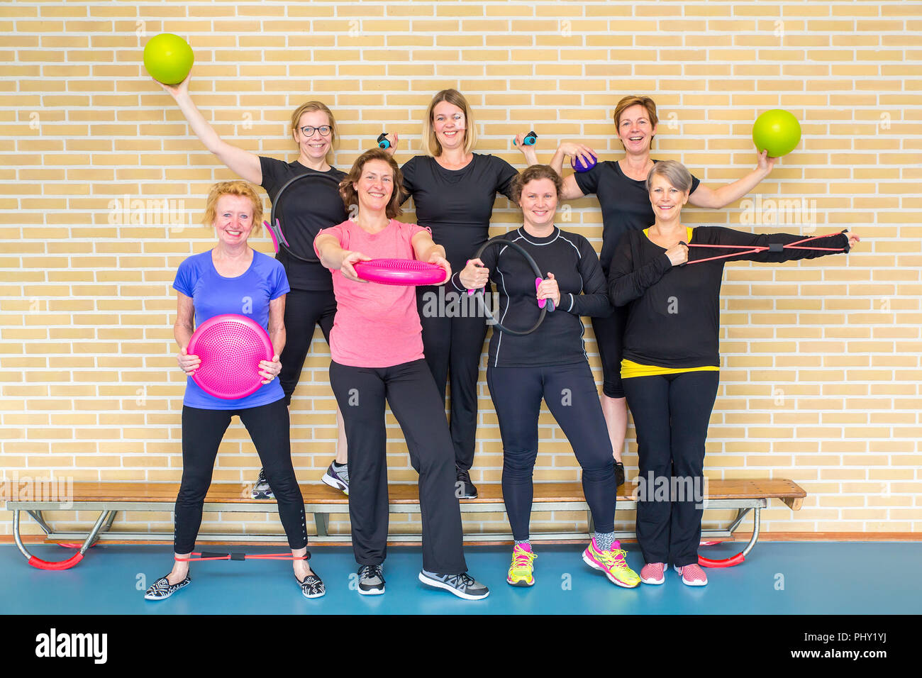 Group photo dutch women gym class with sport equipment Stock Photo - Alamy