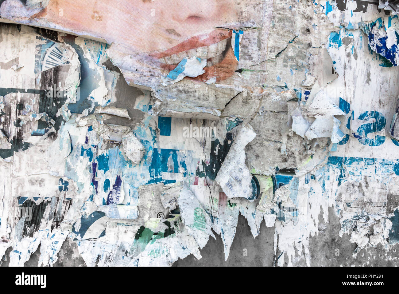 Old torn posters Stock Photo - Alamy