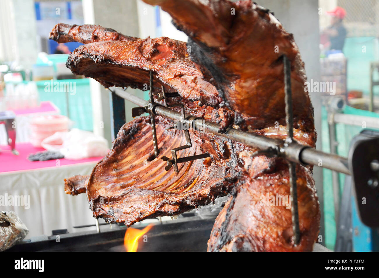 The raw lamb meat has been mixed with various spices and grilled using ...