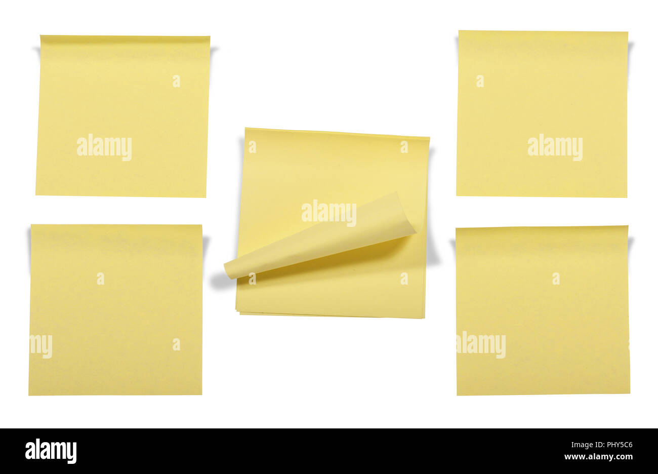 Collection of yellow notepads isolated over white background Stock ...