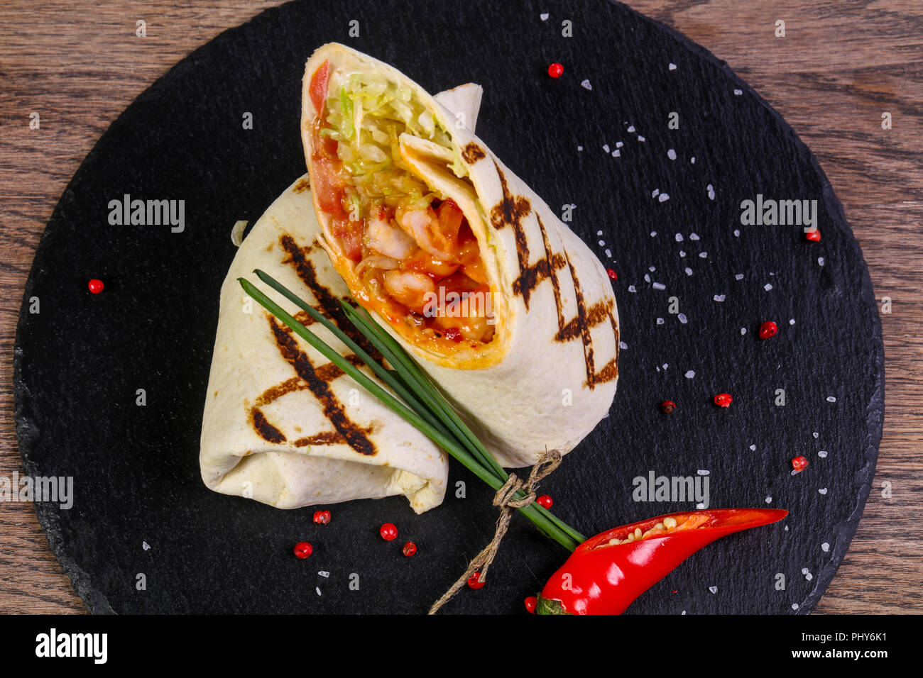 Chicken roll with tortilla served pepper Stock Photo - Alamy