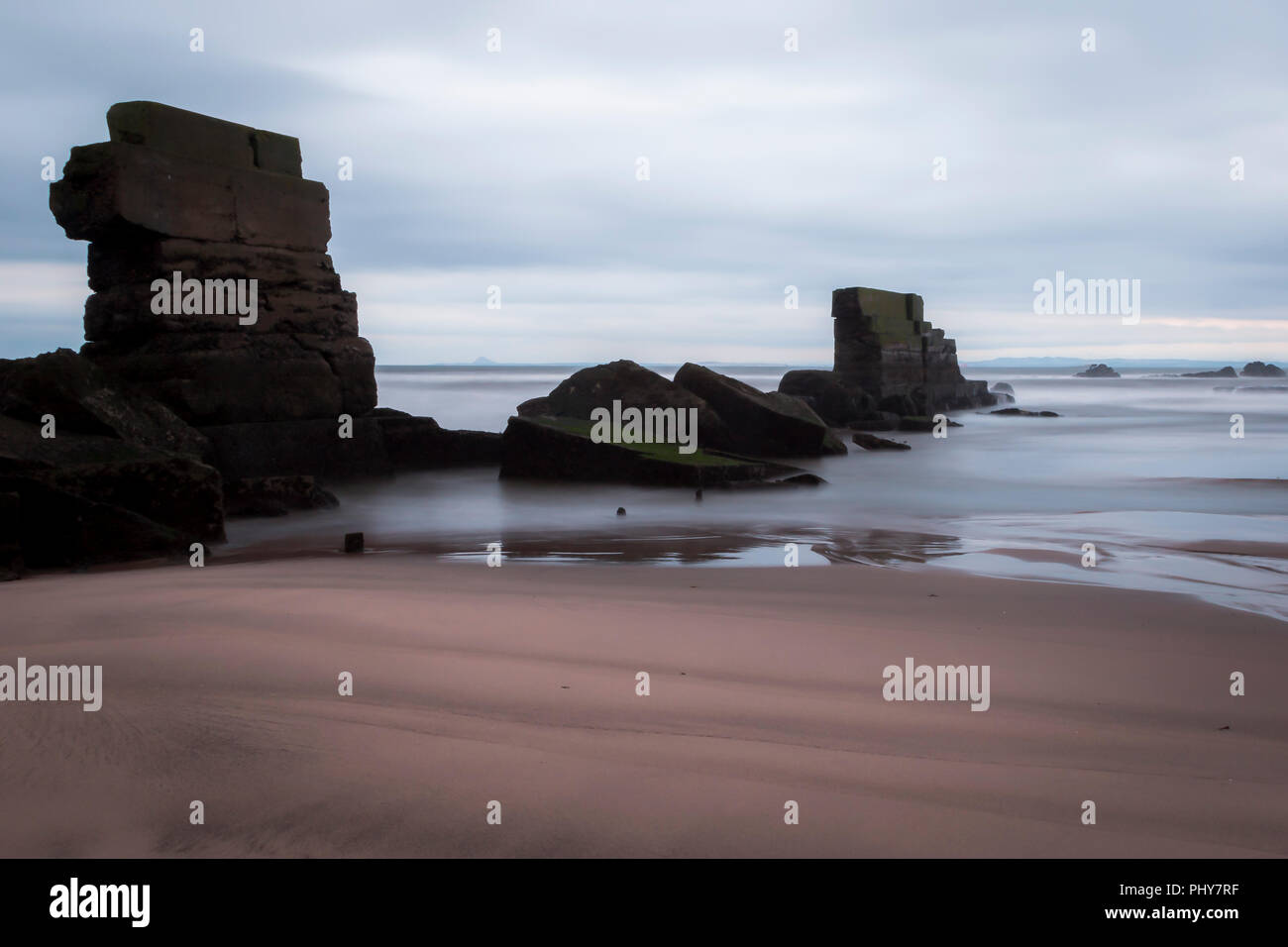 Big rocks from a collapsed sea wall on Seafield Beach in Kirkcaldy ...