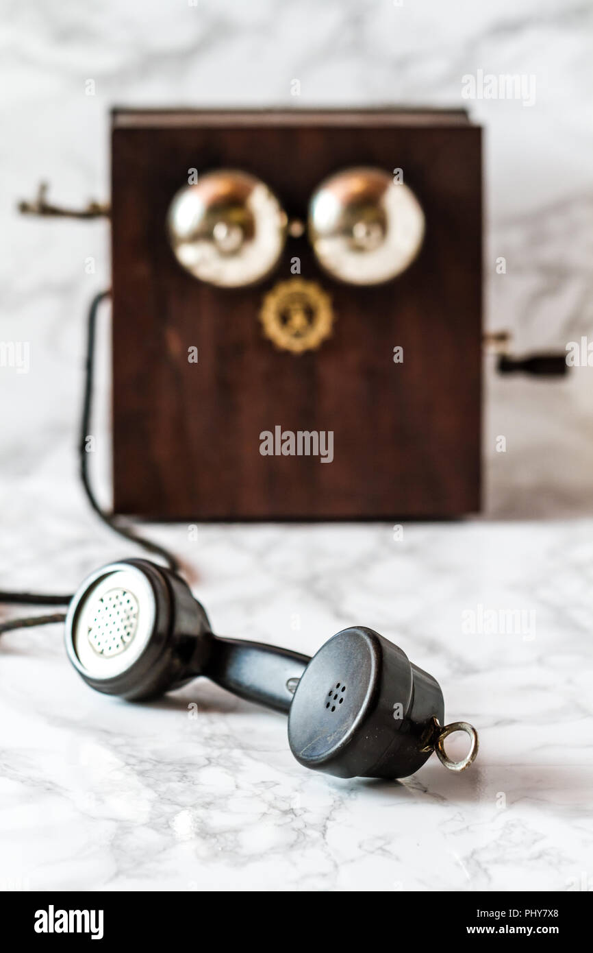 Antique magneto hand crank telephone set on marble background Stock ...