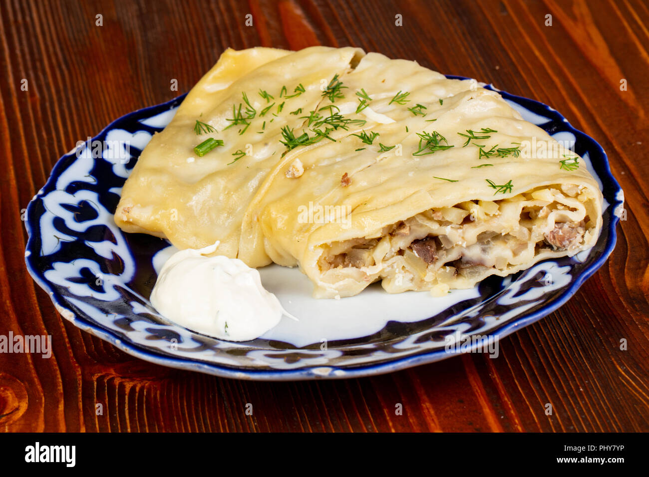 Traditional uzbek Hanum wiht meat Stock Photo - Alamy