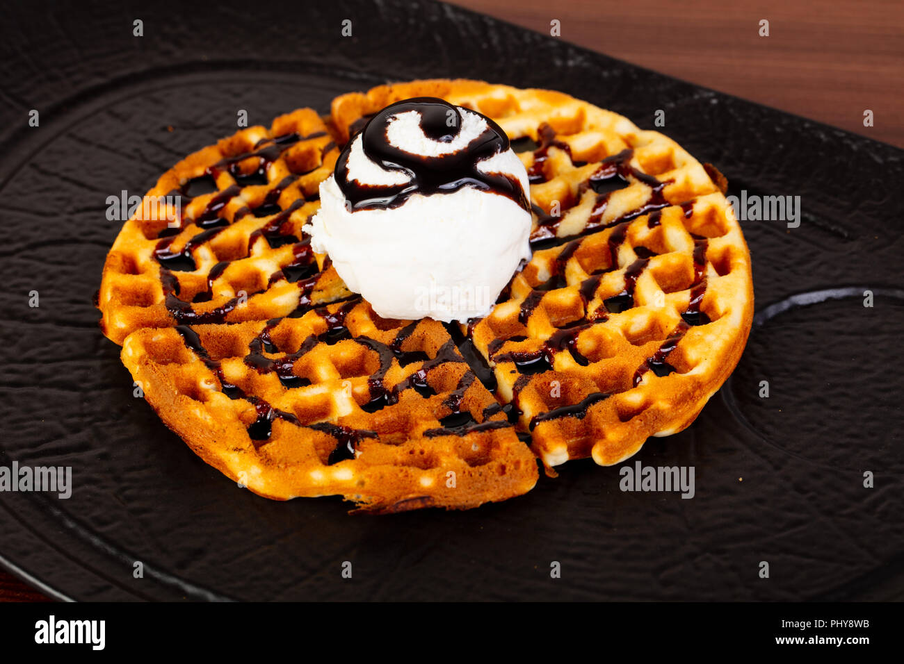 Viennese waffles with sweet syrope Stock Photo - Alamy