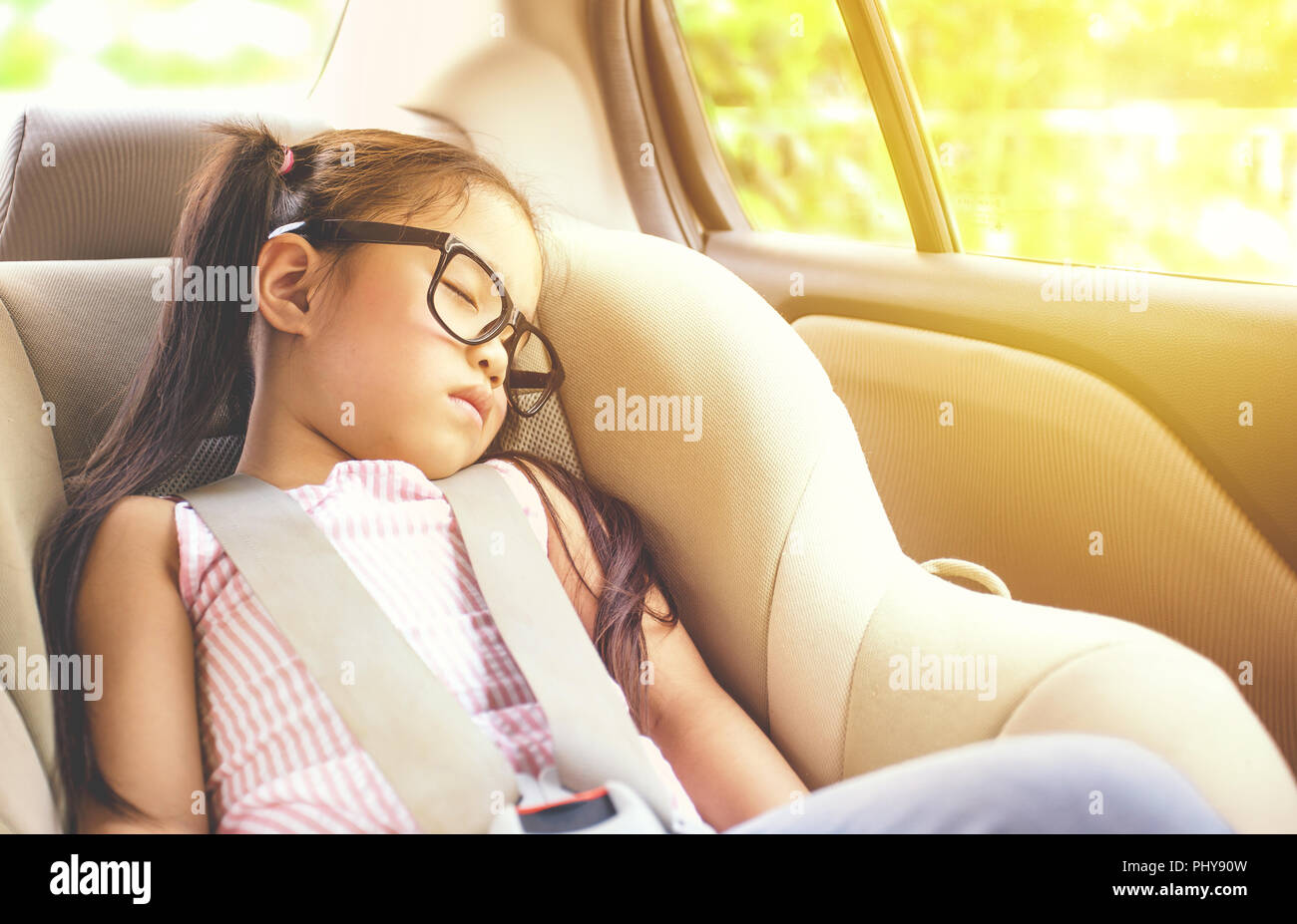 girl sleeping in child car seat Stock Photo - Alamy