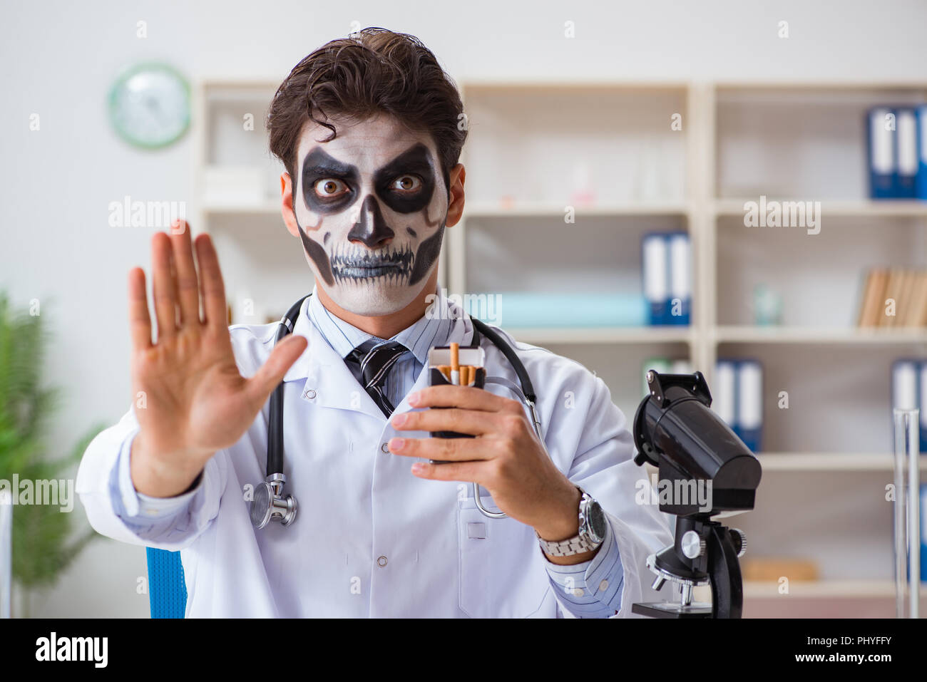 Scary monster doctor working in lab Stock Photo - Alamy