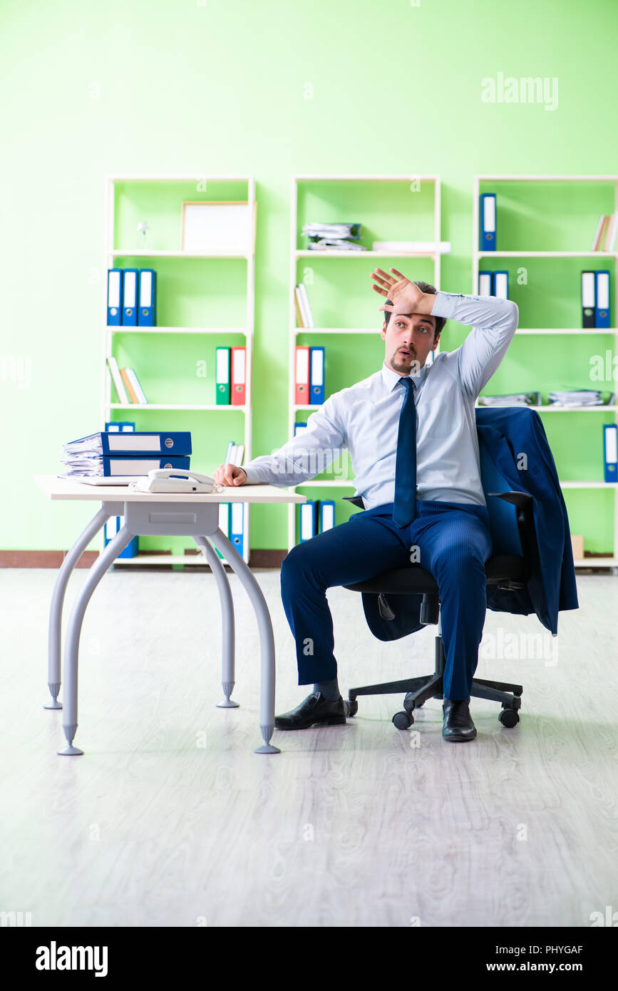 Employee doing exercises during break at work Stock Photo - Alamy