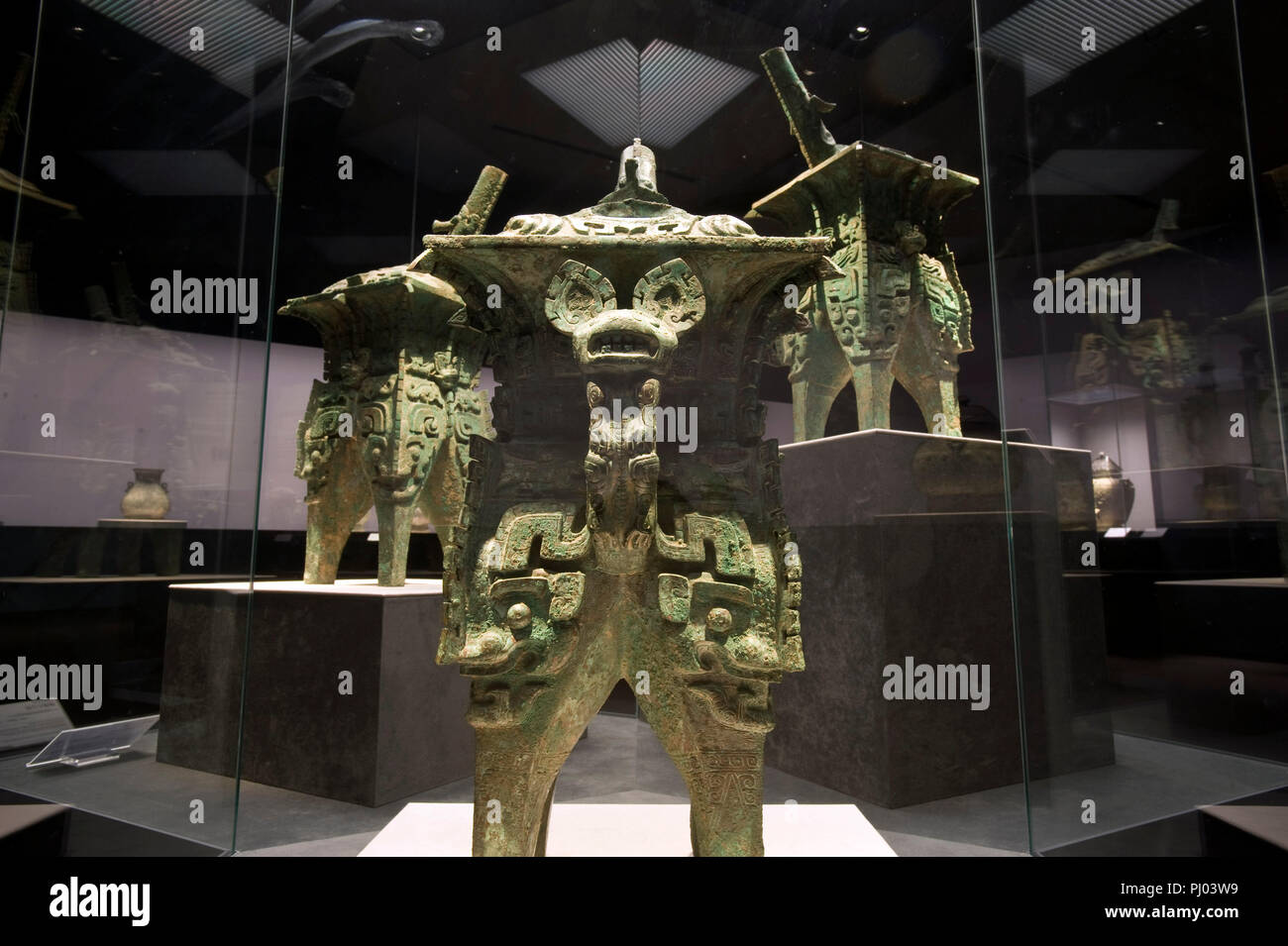 Photo shows Three-headed He with Taotie Design, a set of three bronze ...