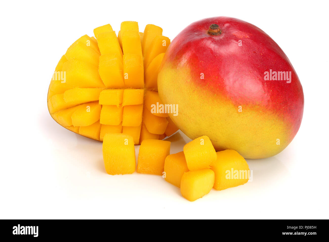 Mango fruit and half isolated on white background close-up Stock Photo ...