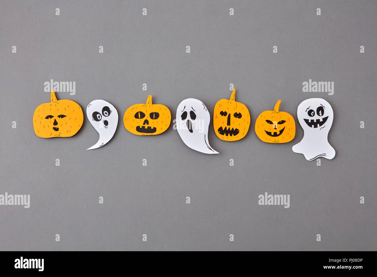 Halloween pattern from handmade paper scary ghosts and spirits, yellow ...