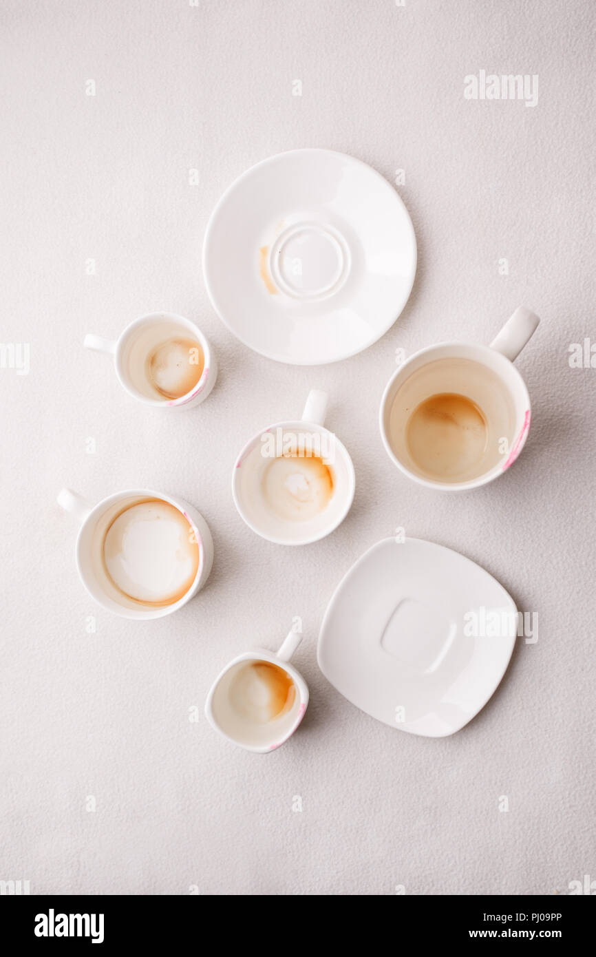 Many Empty coffee cups after drink on white background, trendy minimal ...