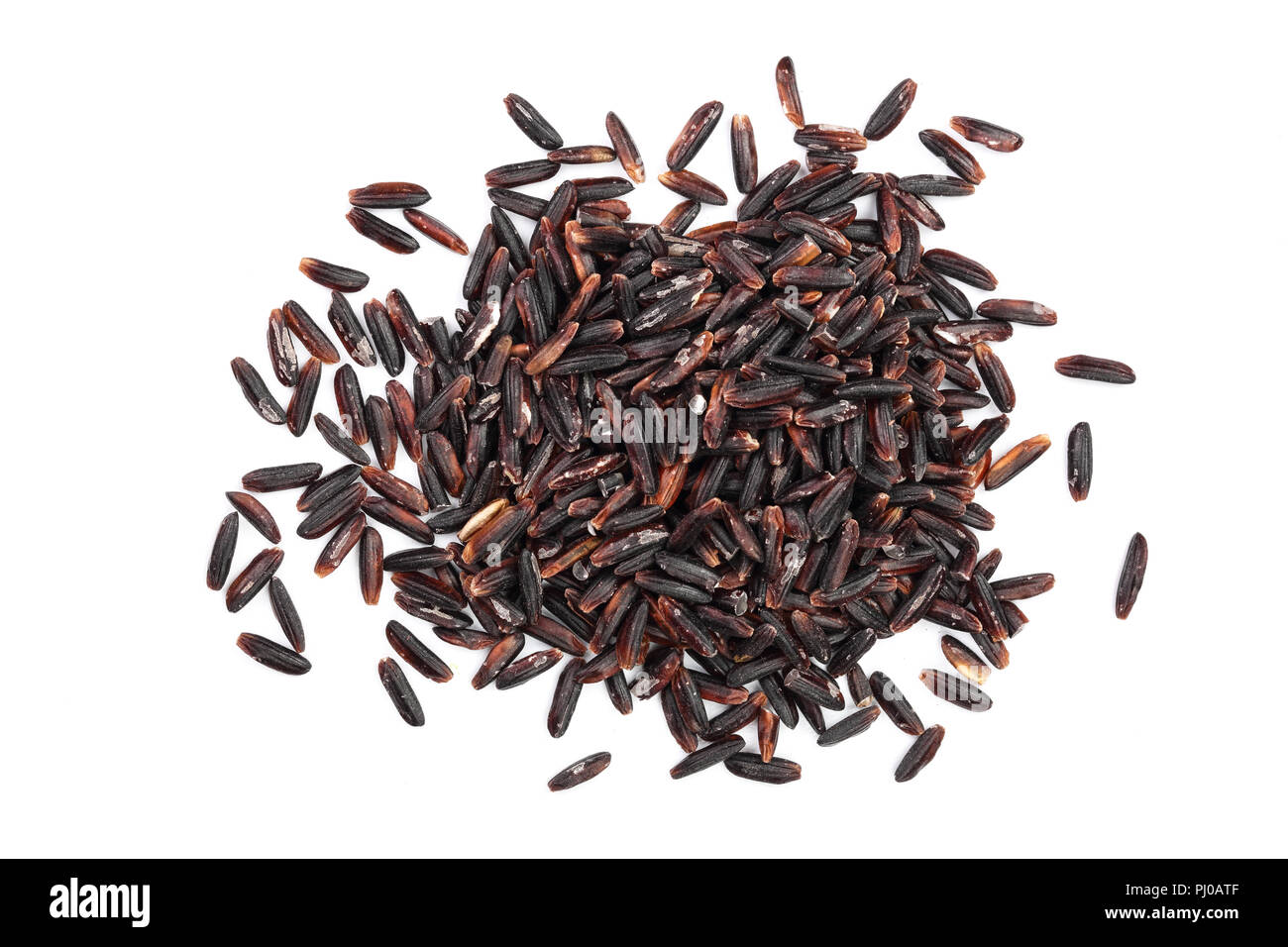 Black wild rice isolated on white background close up. Top view. Flat ...