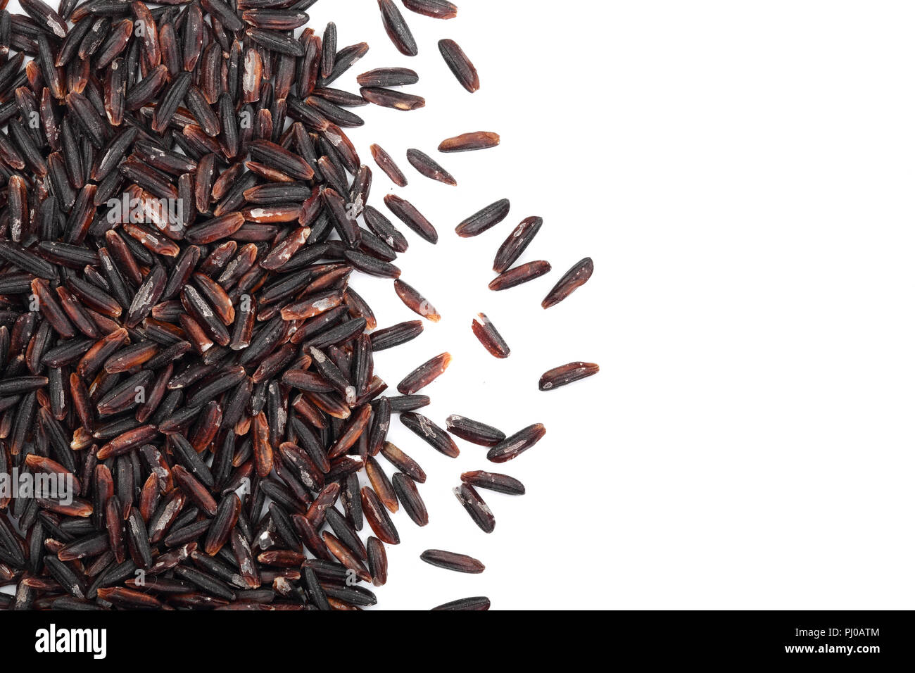 Black wild rice isolated on white background with copy space for your ...