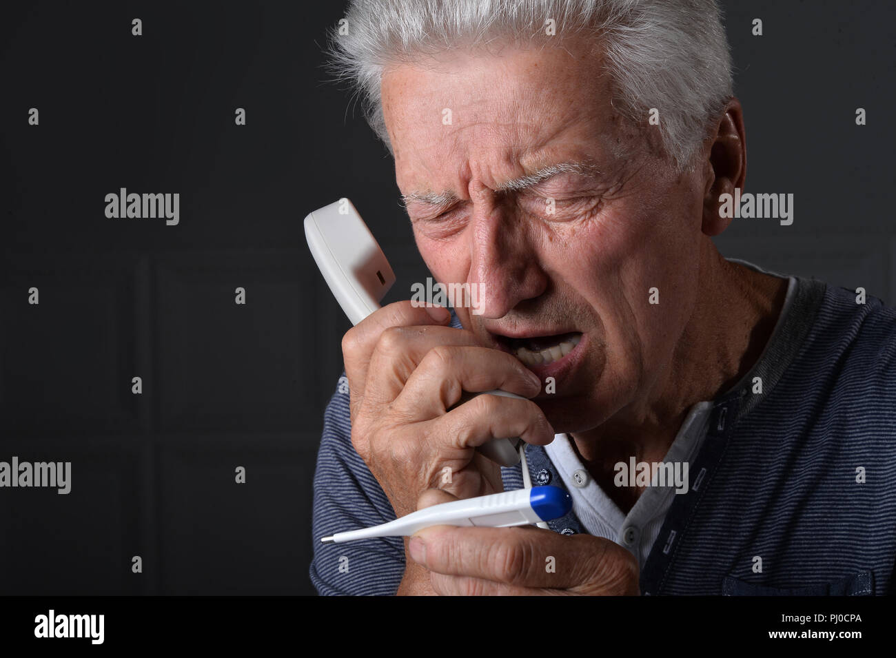Portrait of a sick senior man calling to hospital Stock Photo - Alamy