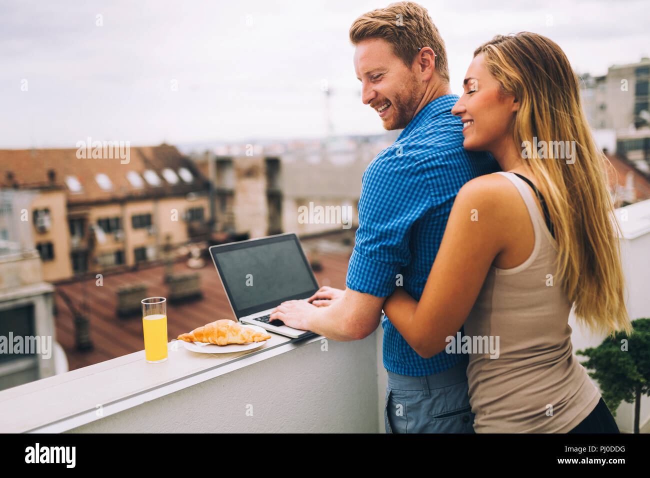 Girl hugging laptop hi-res stock photography and images - Alamy